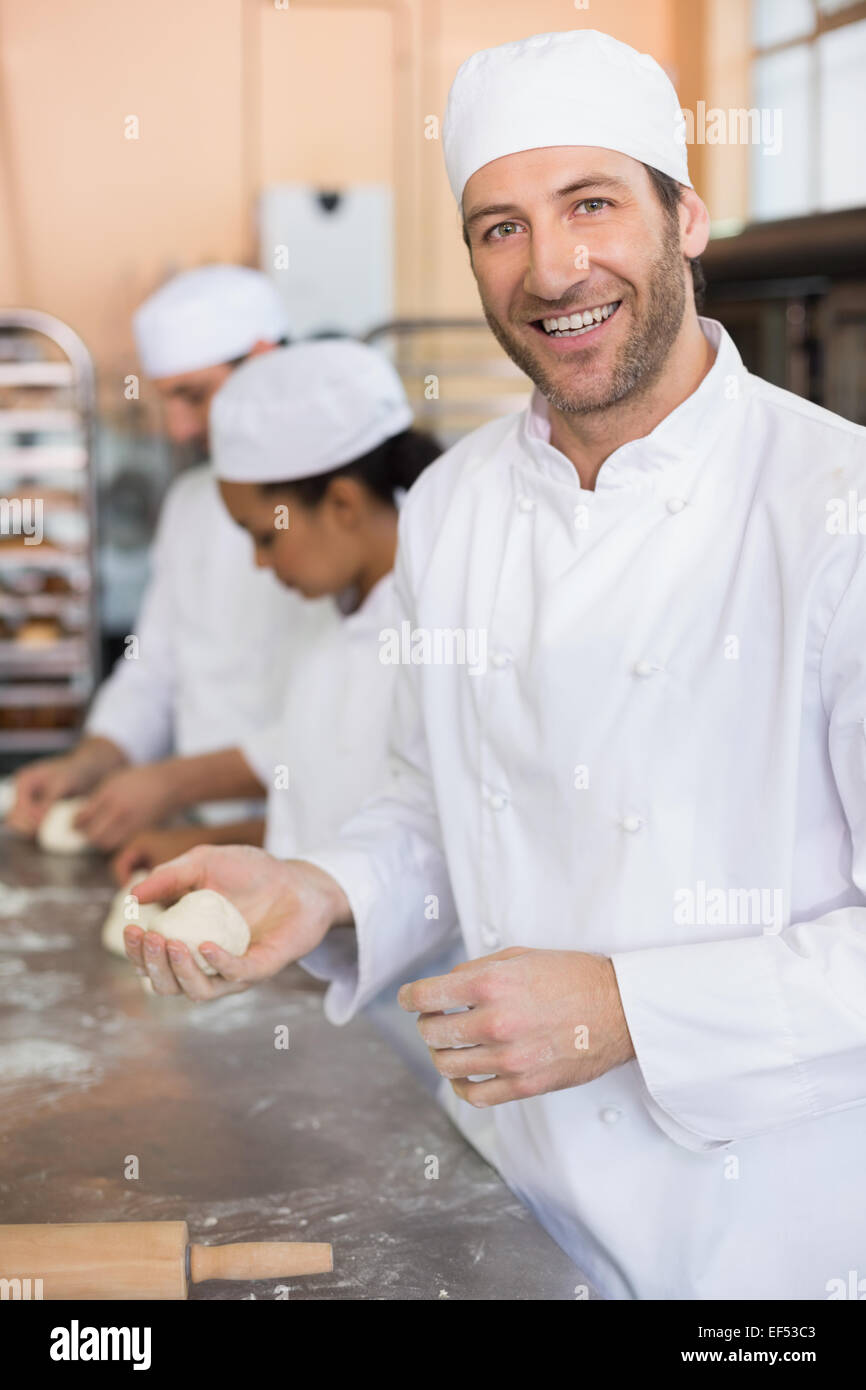 Team bakers working counter hi-res stock photography and images - Alamy