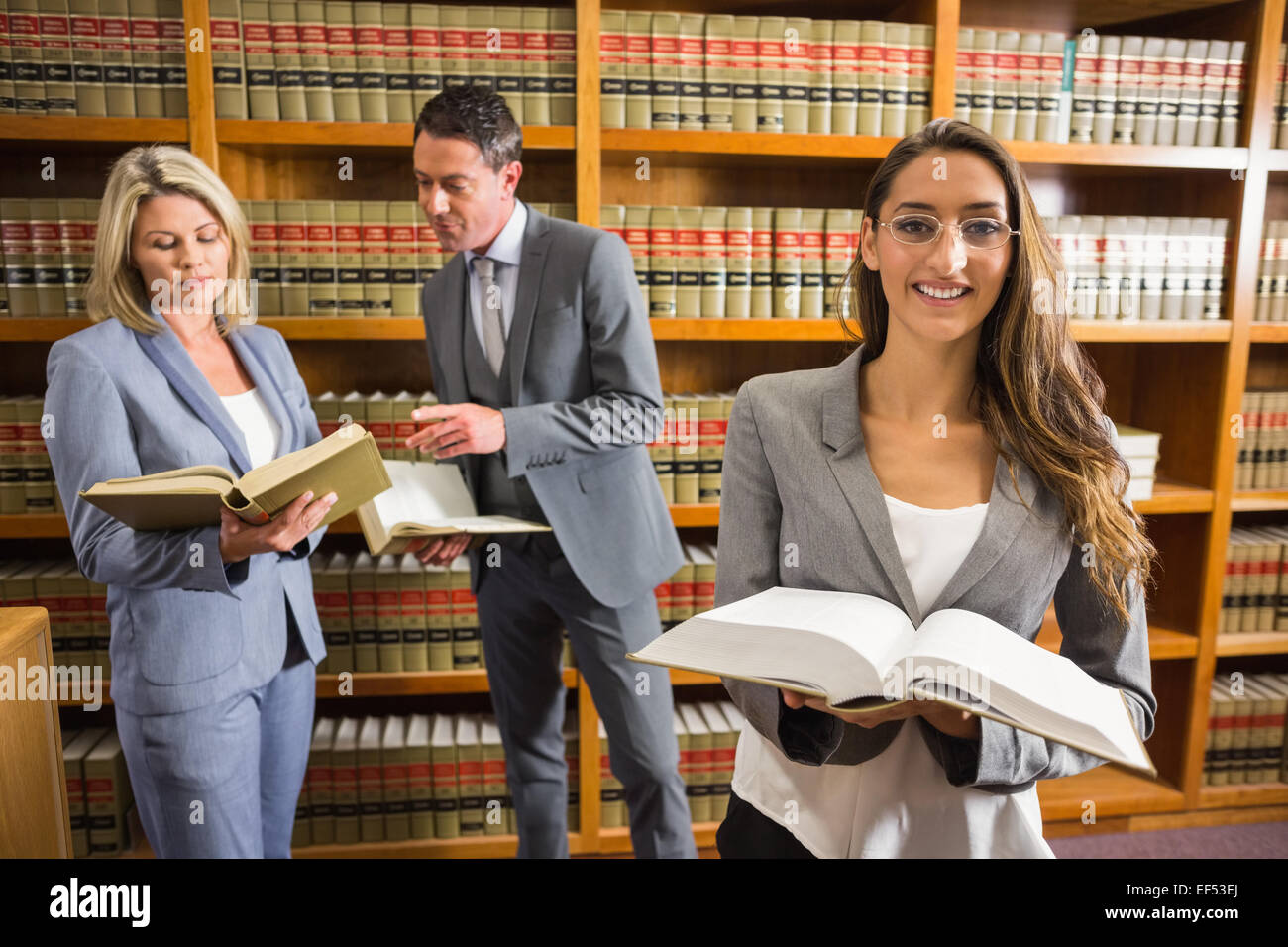 Lawyers in the law library Stock Photo - Alamy