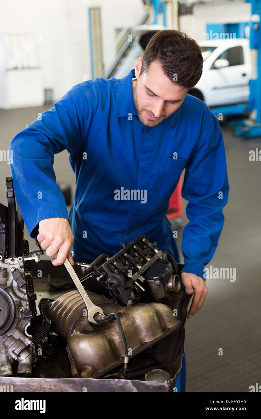 Mechanic working on an engine Stock Photo - Alamy