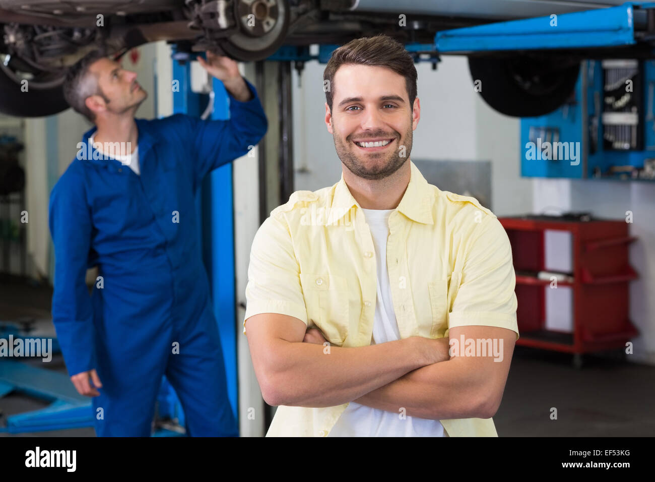 Customer smiling at the camera Stock Photo - Alamy