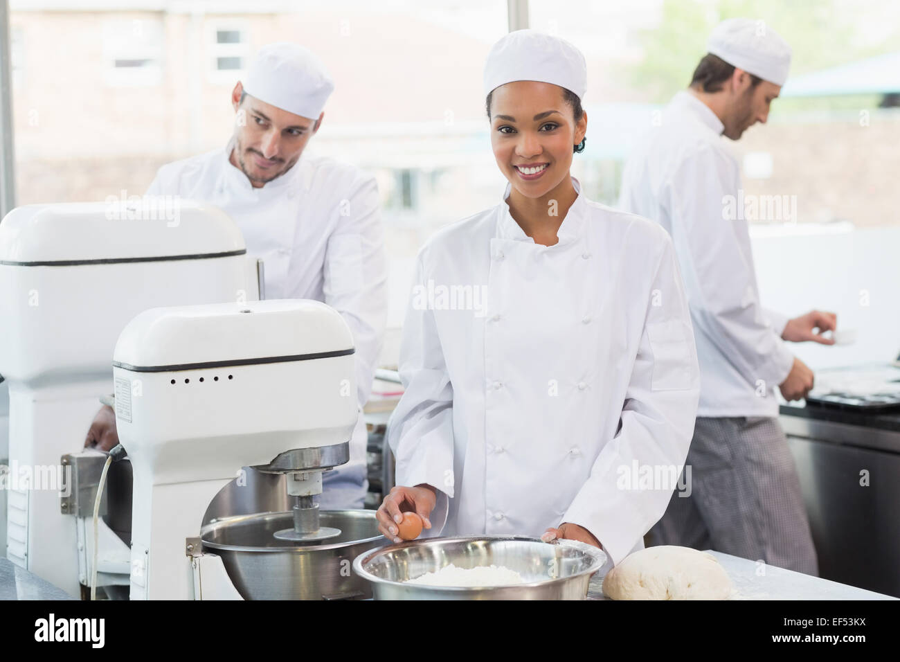 Team bakers working counter hi-res stock photography and images - Alamy