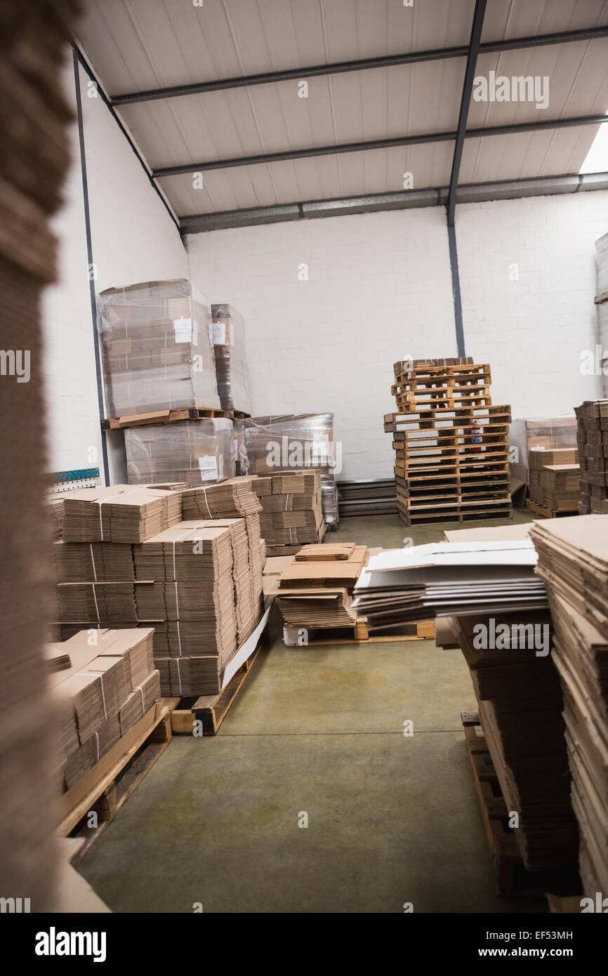 Many stack of cardboard boxes Stock Photo - Alamy