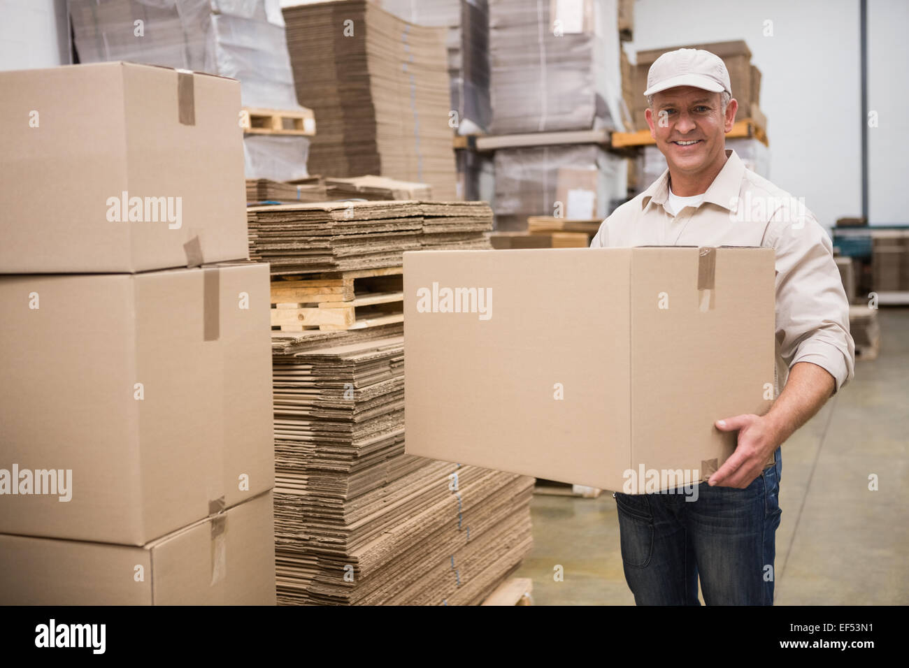 Portrait factory carrying cardboard boxes hi-res stock photography and ...
