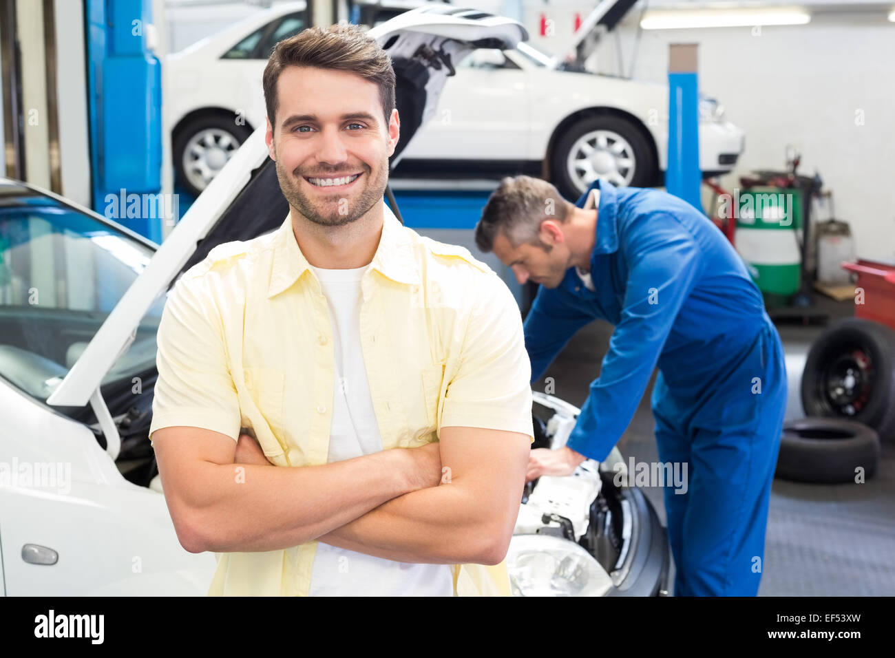 Customer smiling at the camera Stock Photo - Alamy