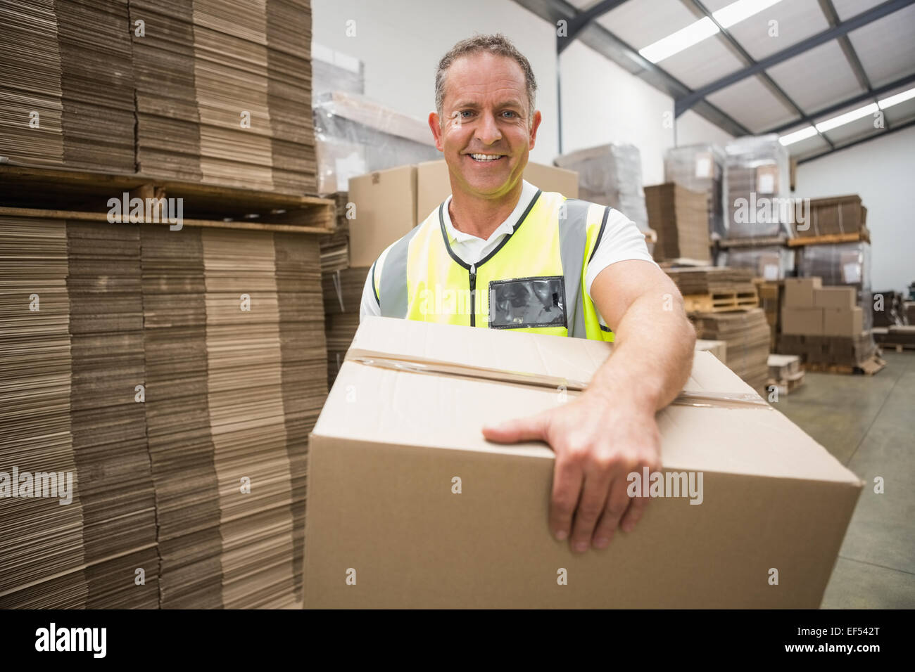 Portrait factory carrying cardboard boxes hi-res stock photography and ...