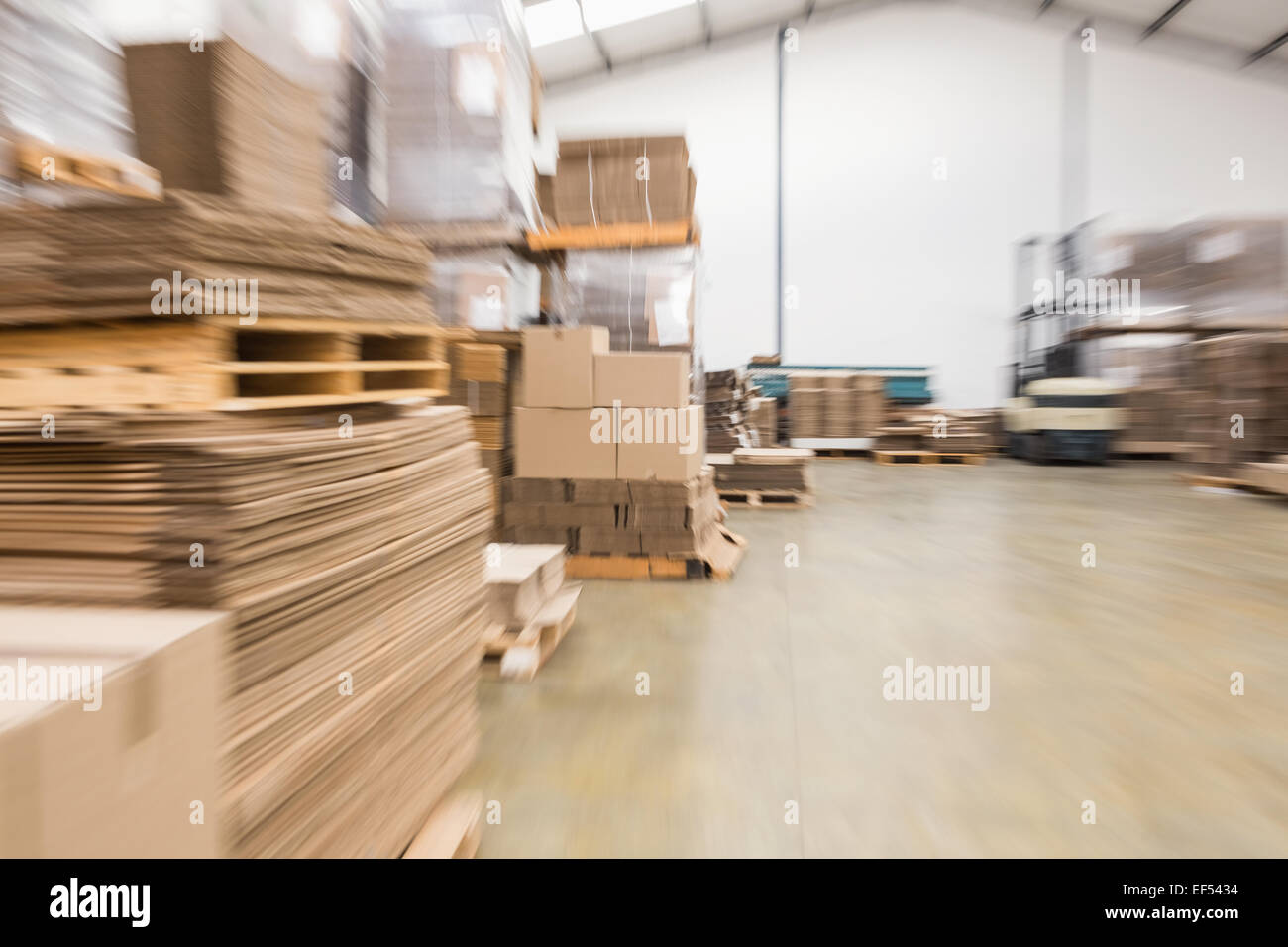 Cardboard boxes in warehouse Stock Photo - Alamy