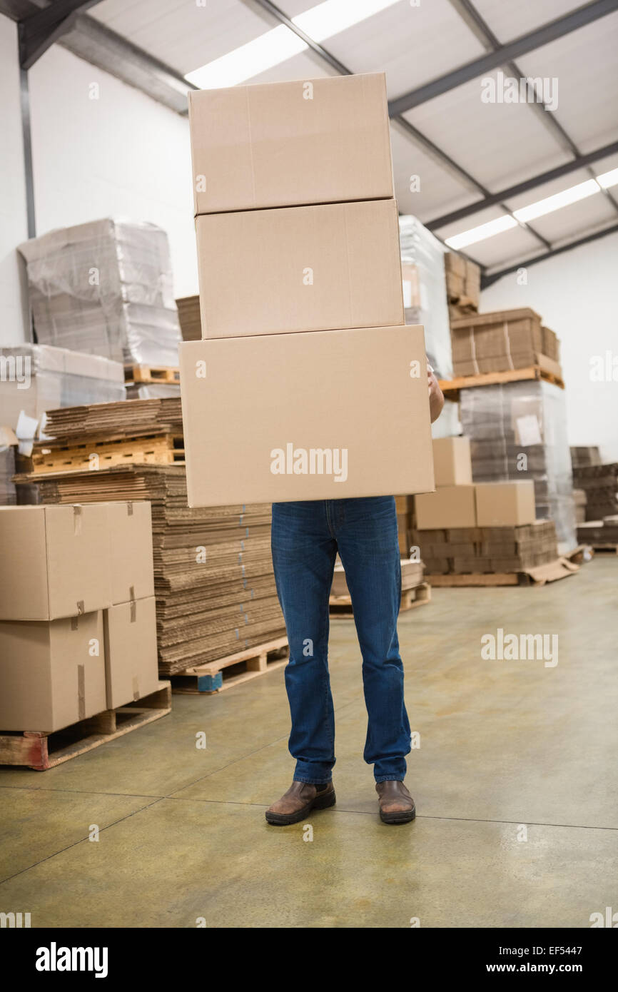 Obscured man carrying boxes hi-res stock photography and images - Alamy