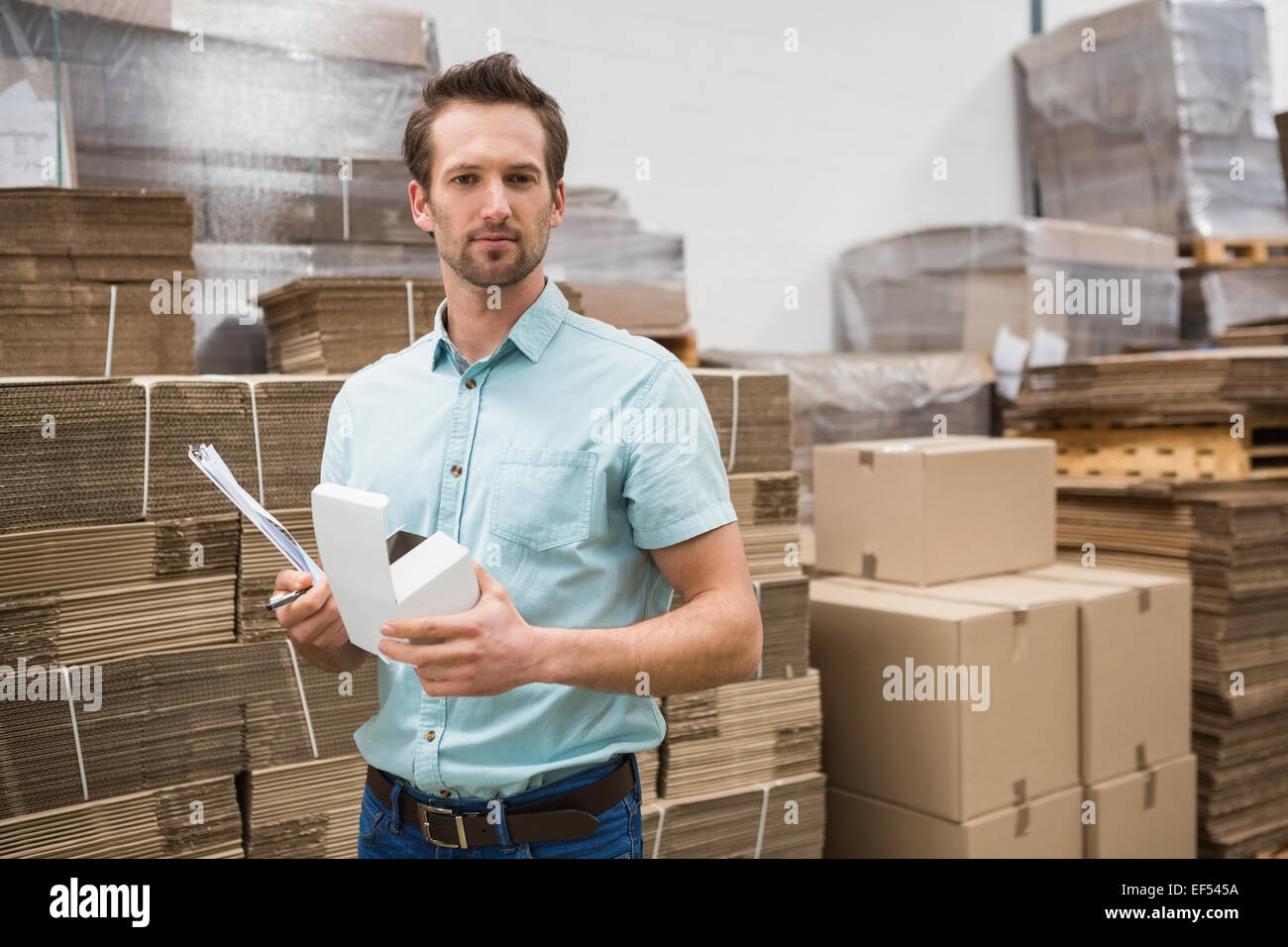 Portrait factory carrying cardboard boxes hi-res stock photography and ...
