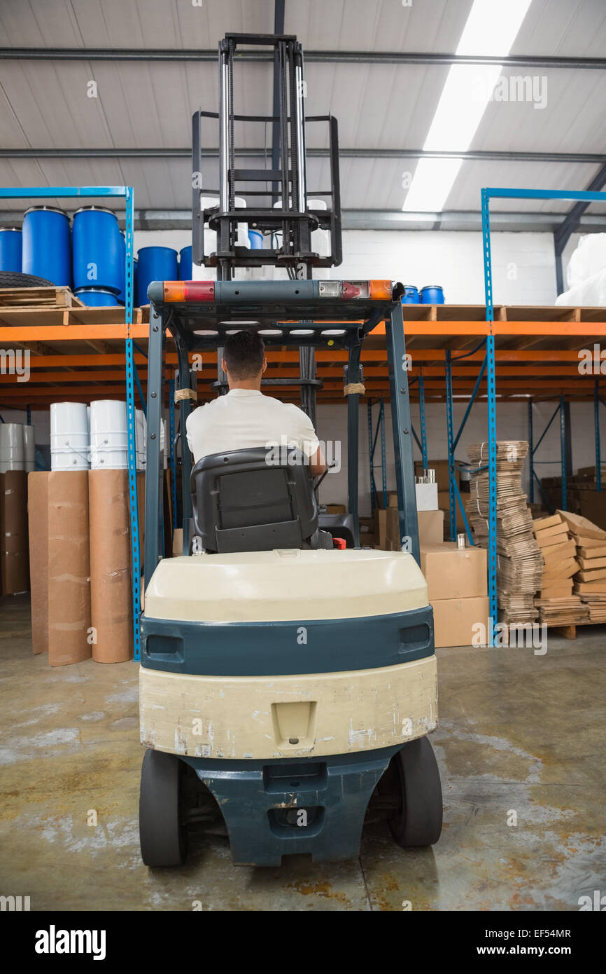 Rear view of forklift machine Stock Photo - Alamy