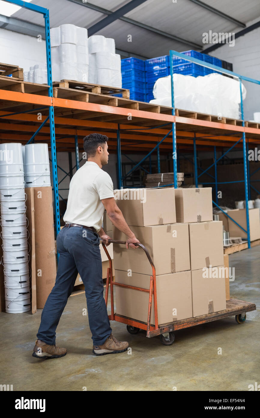 Pushing trolley hi-res stock photography and images - Alamy