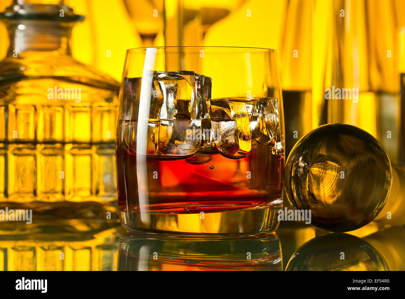 alcoholic drinks in bar on glass table Stock Photo - Alamy