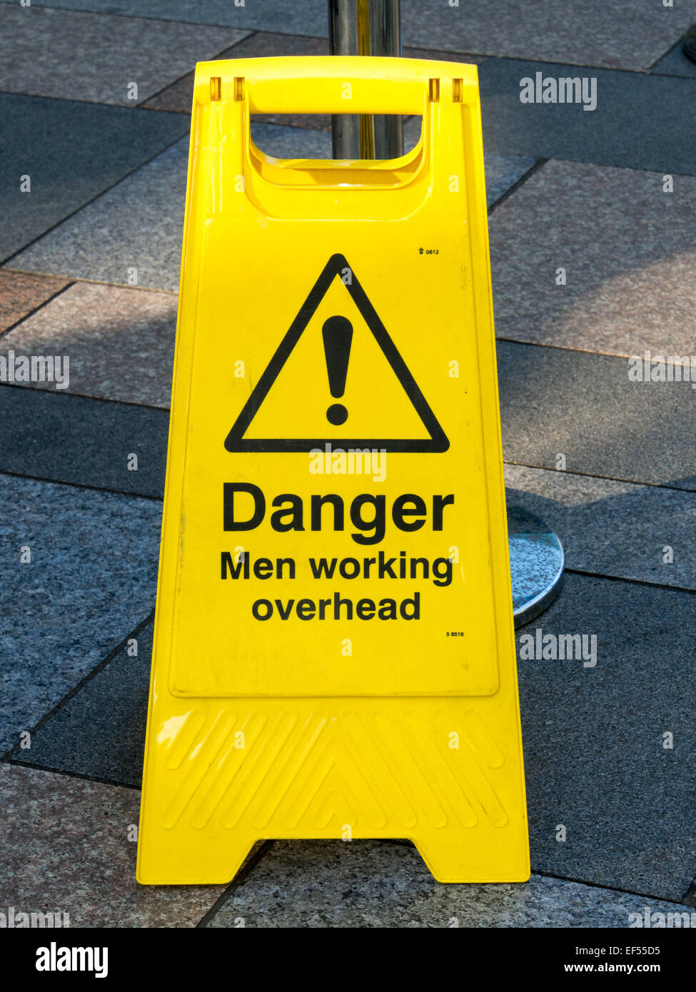 Yellow "Men working Overhead" floor signage in Shires Lane Leicester ...