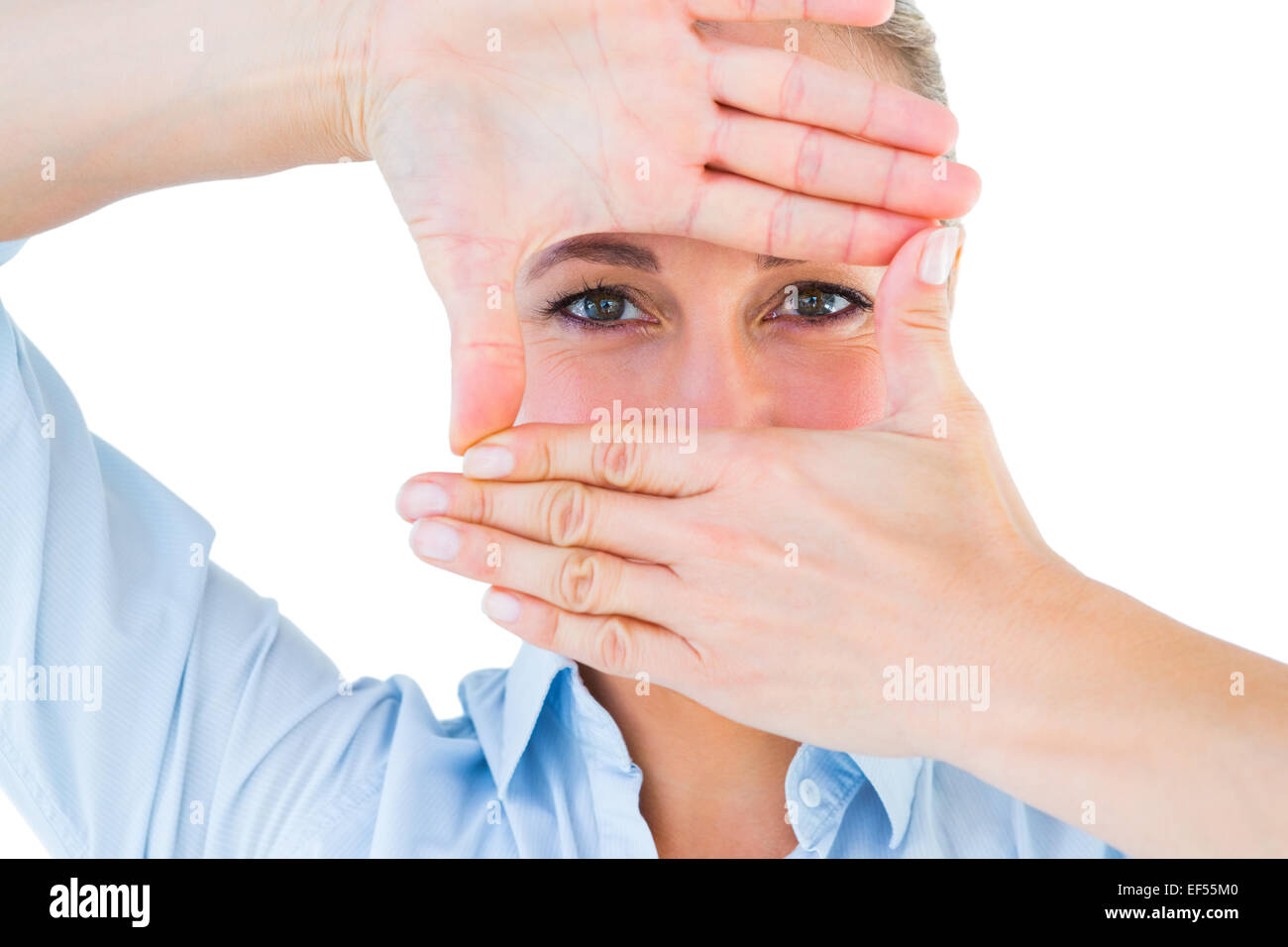 Pretty blonde making a hand gesture Stock Photo - Alamy
