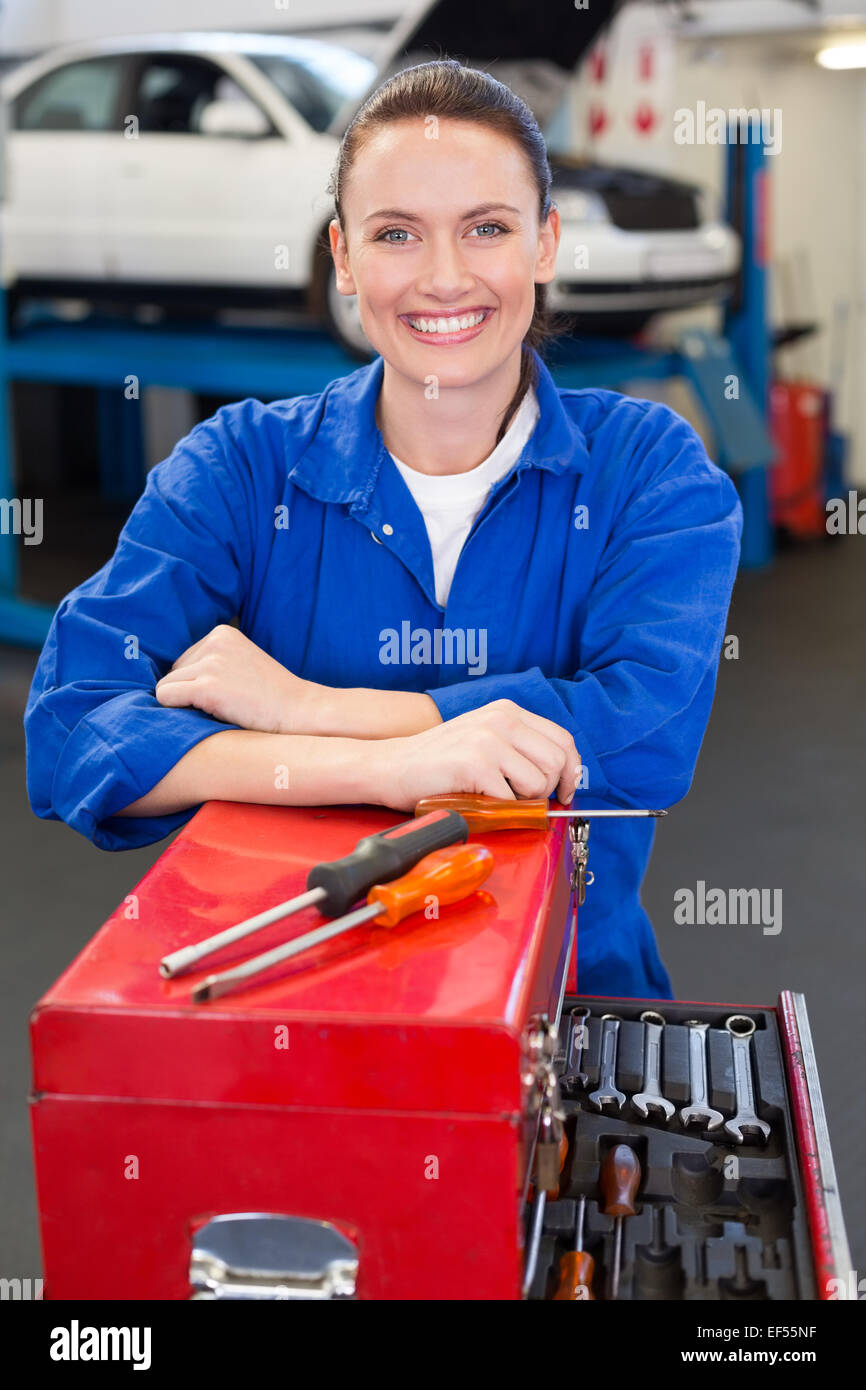Mechanic smiling at the camera Stock Photo - Alamy