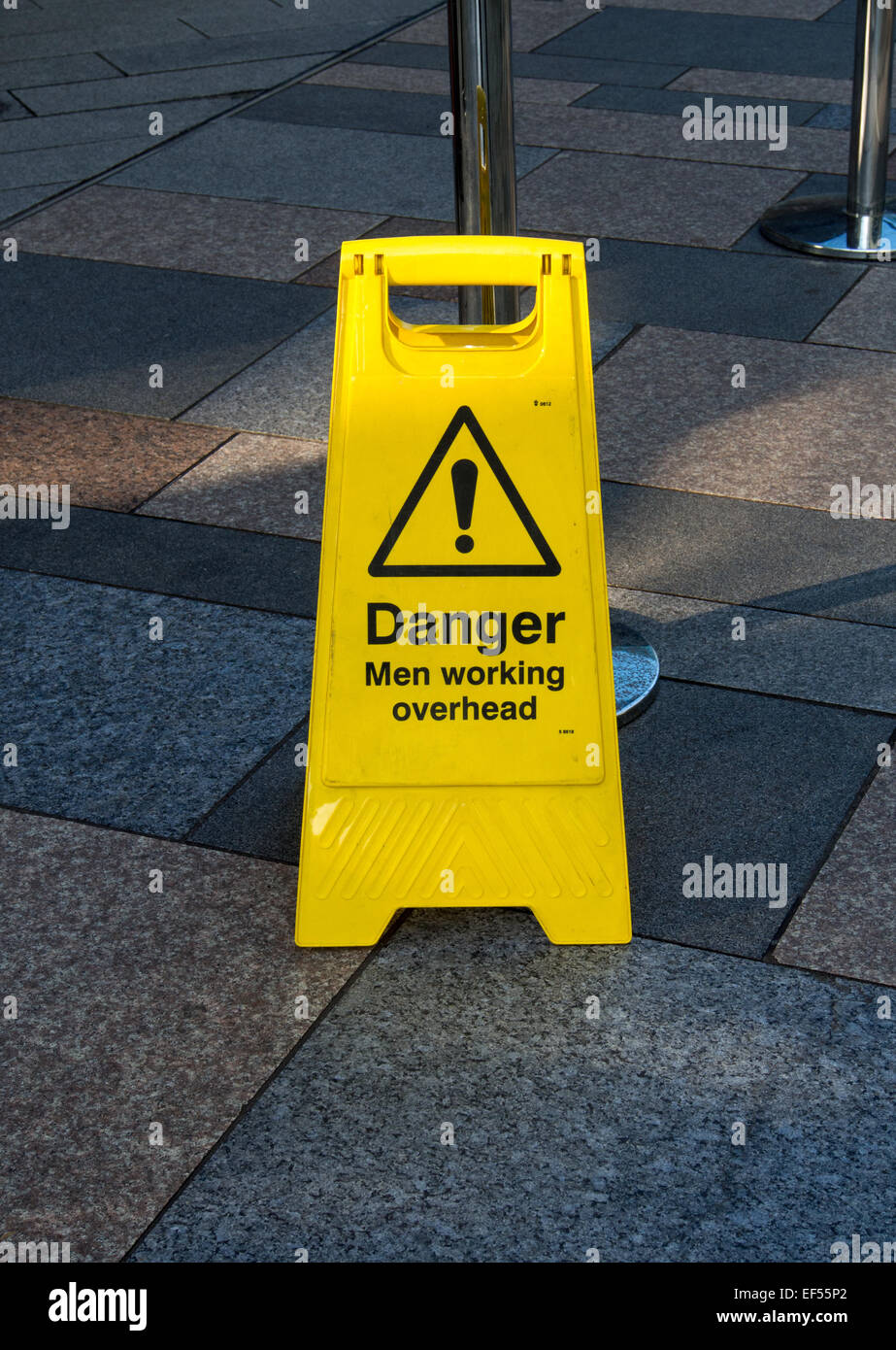 Yellow "Men working Overhead" floor signage in Shires Lane Leicester ...