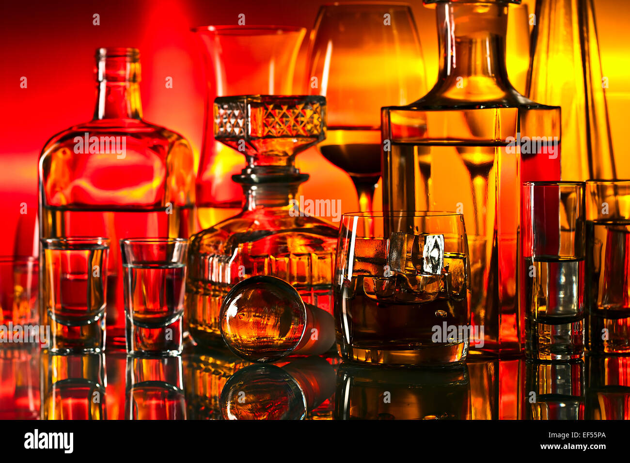 alcoholic drinks in bar on glass table Stock Photo - Alamy