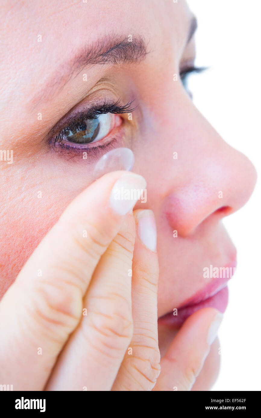 Putting in contact lens hi-res stock photography and images - Alamy