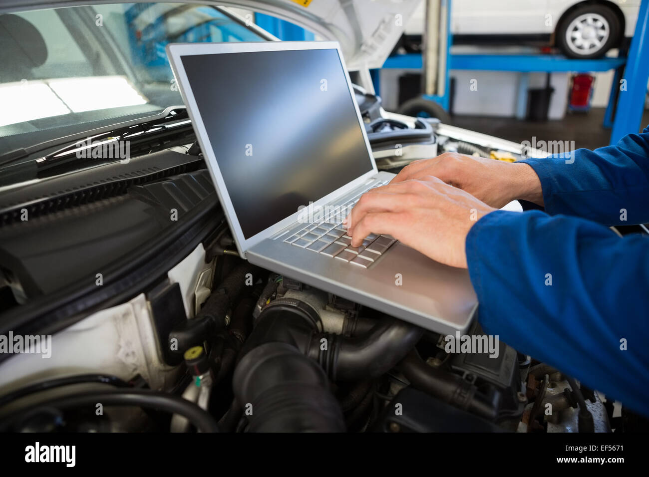 Laptop on hood of car hi-res stock photography and images - Alamy