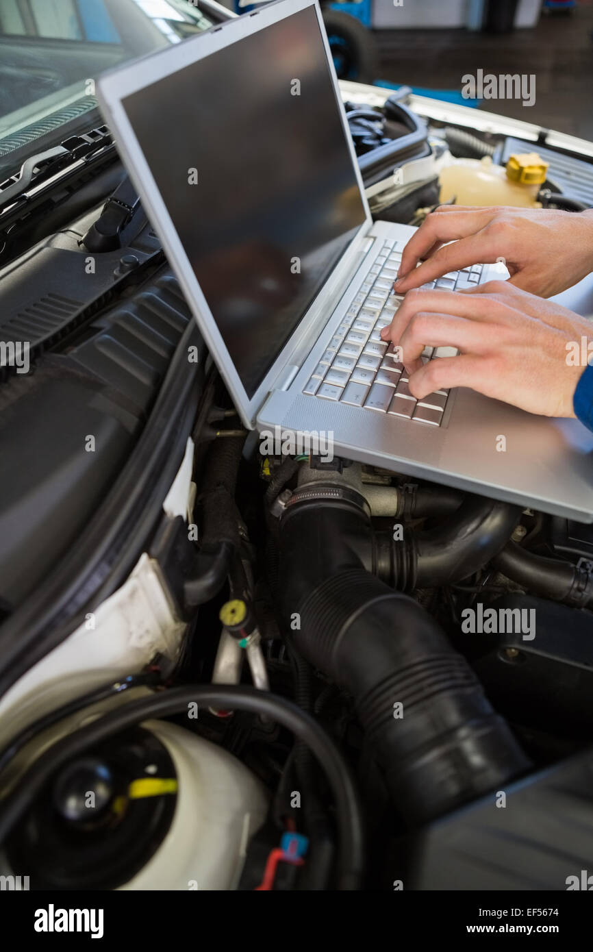 Laptop on hood of car hi-res stock photography and images - Alamy