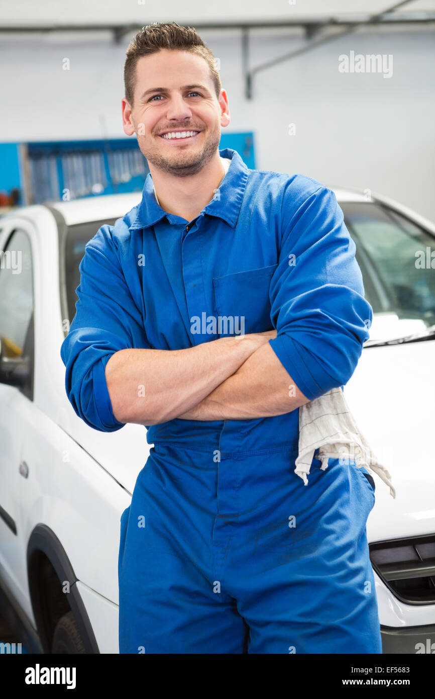Mechanic smiling at the camera Stock Photo - Alamy