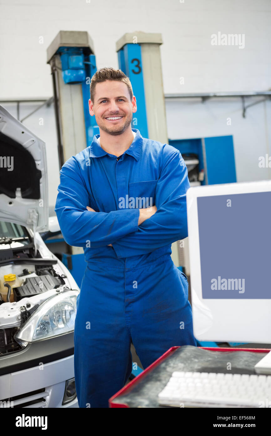 Satisfied customer standing with mechanic hi-res stock photography and ...