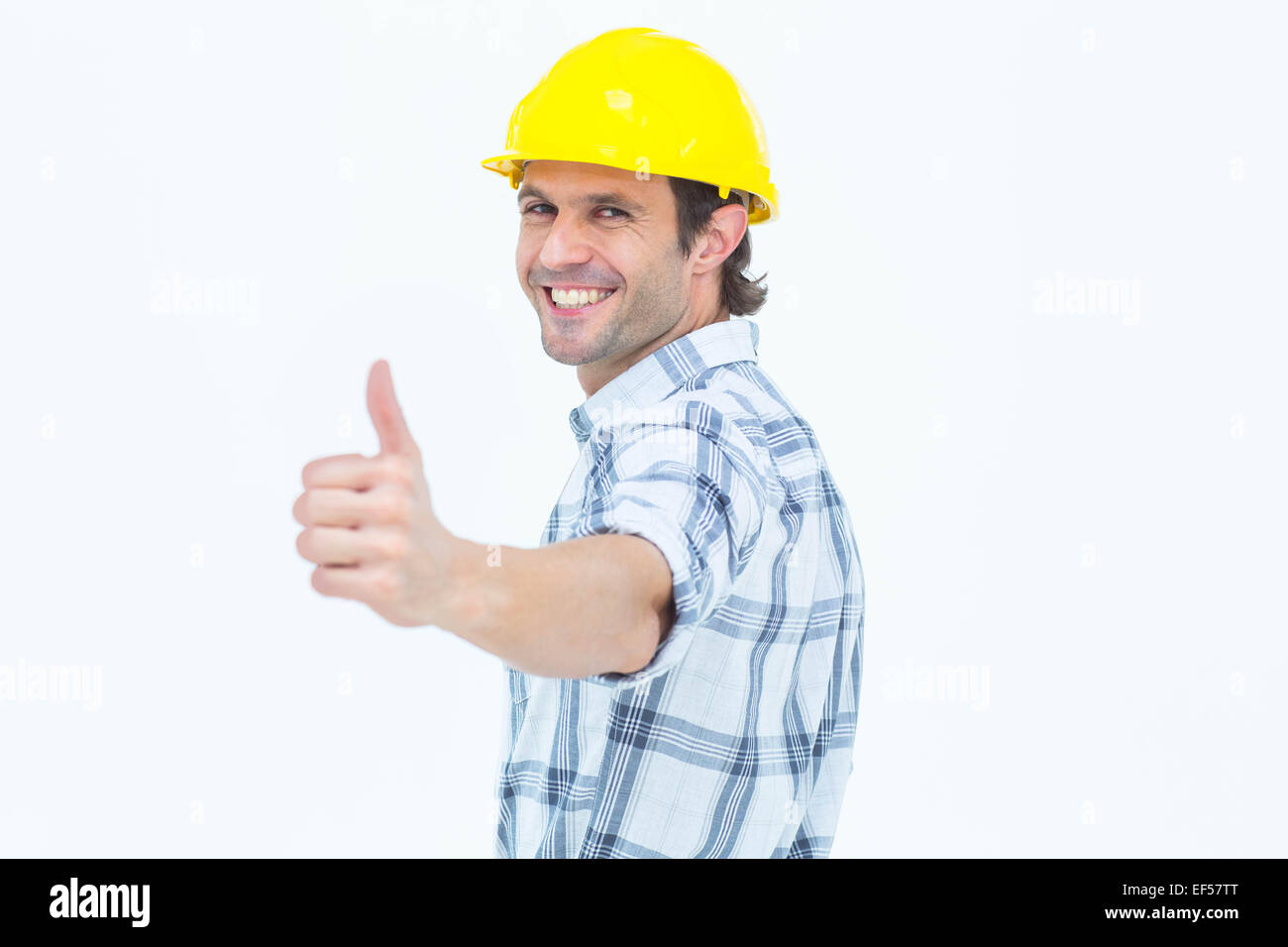Happy technician gesturing thumbs up Stock Photo - Alamy