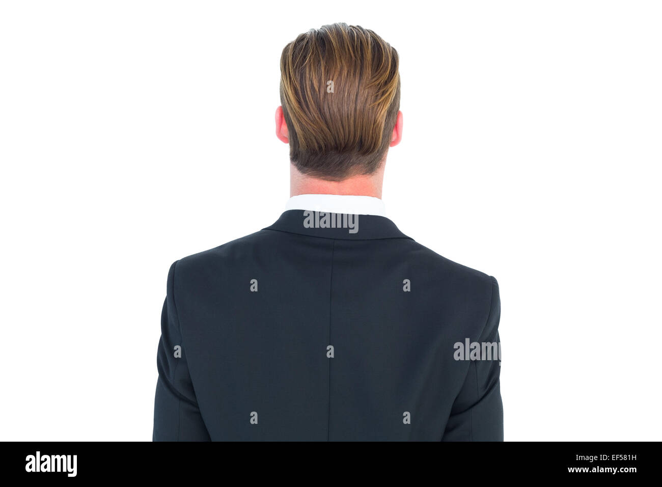 Rear view of elegant businessman in suit posing Stock Photo - Alamy