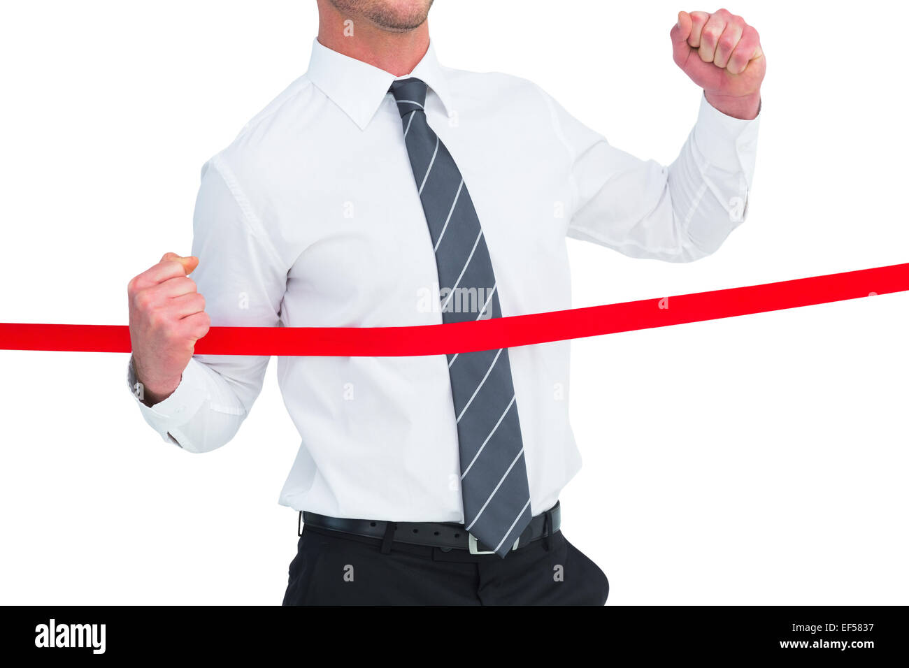 Businessman crossing the finish line Stock Photo - Alamy