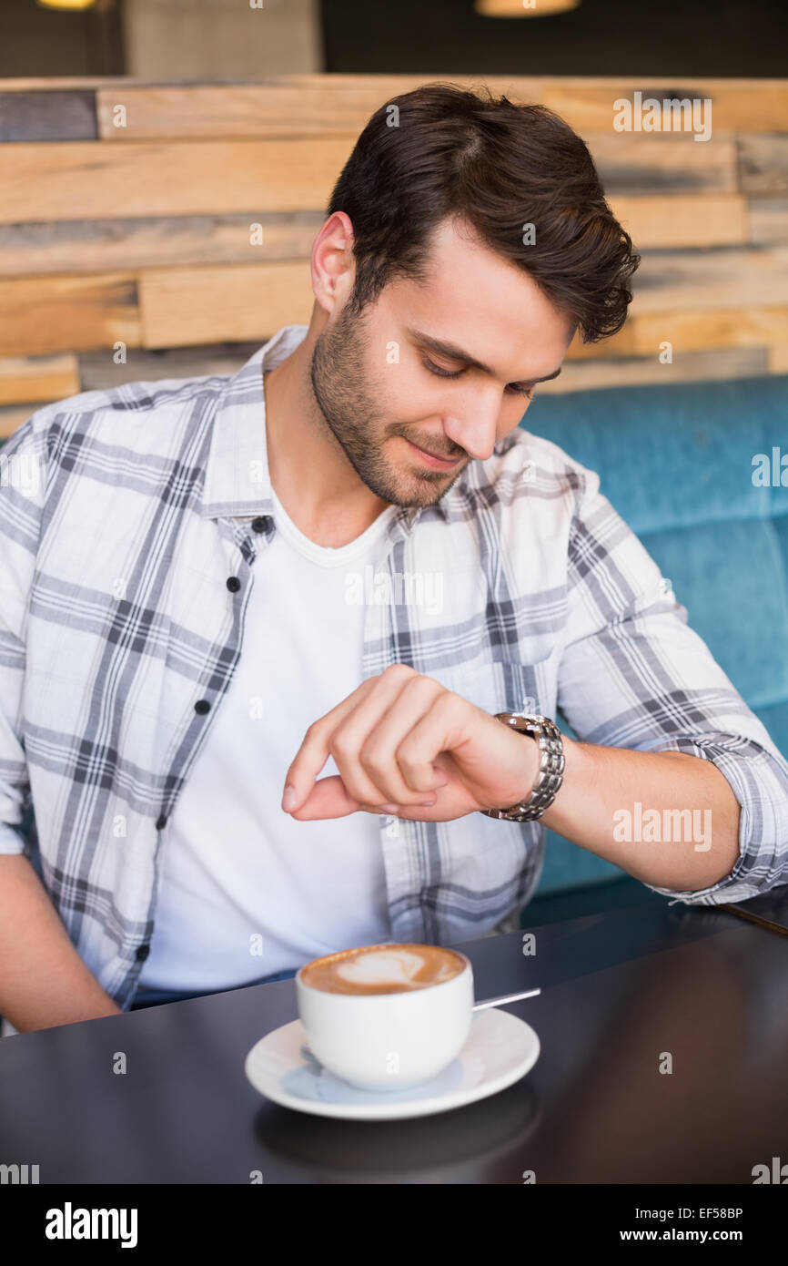 Young man waiting for someone Stock Photo - Alamy