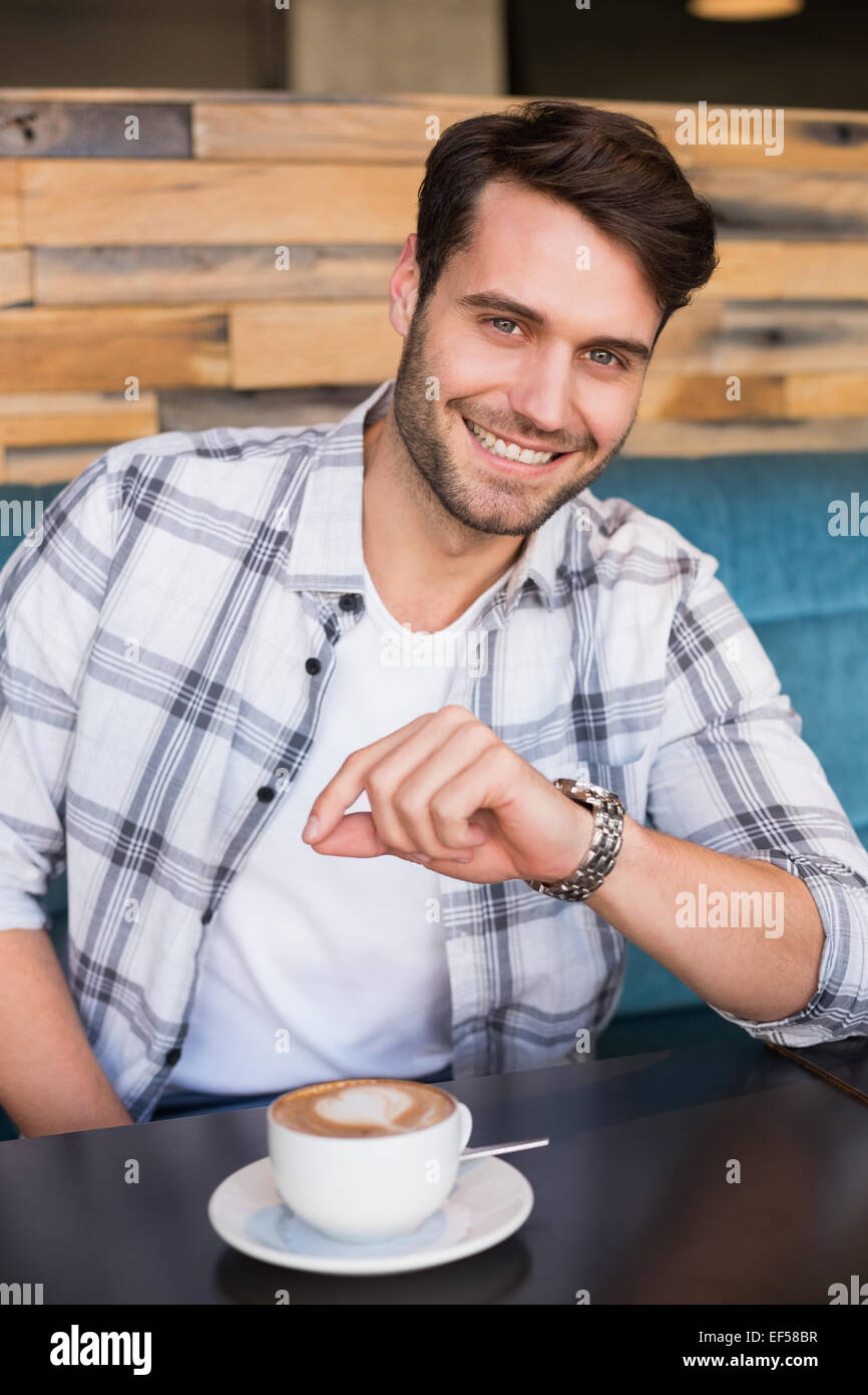 Young man waiting for someone Stock Photo - Alamy
