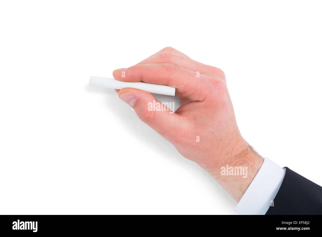 Businessman writing with white chalk Stock Photo - Alamy
