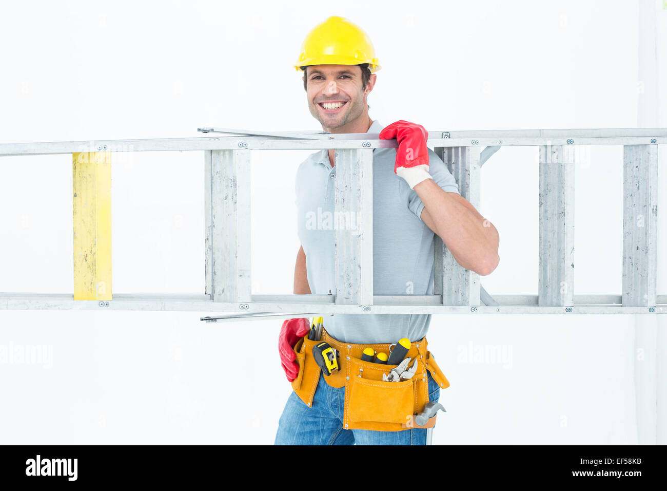 Construction worker carrying ladder hi-res stock photography and images ...