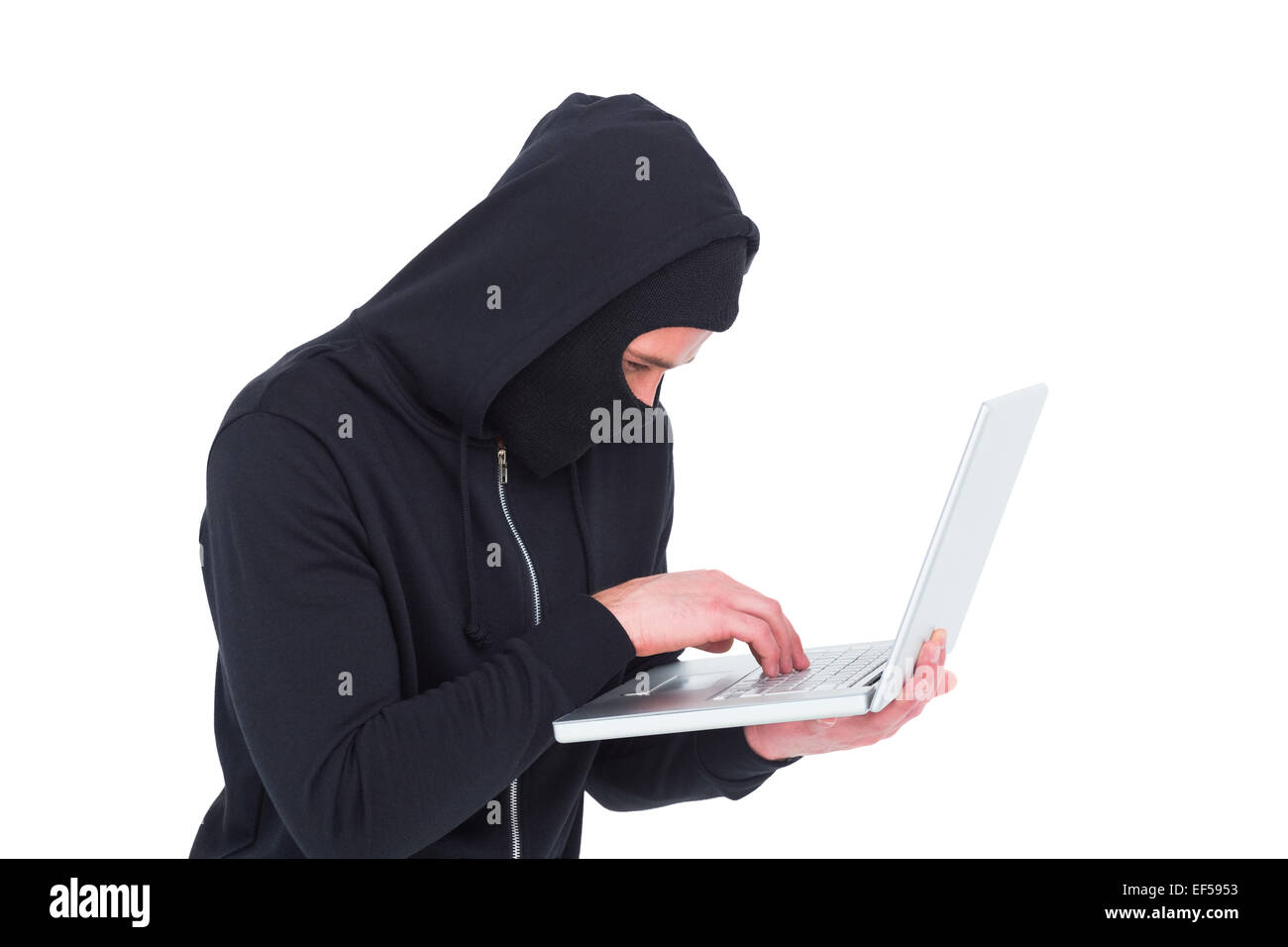 Hacker using computer man Cut Out Stock Images & Pictures - Alamy