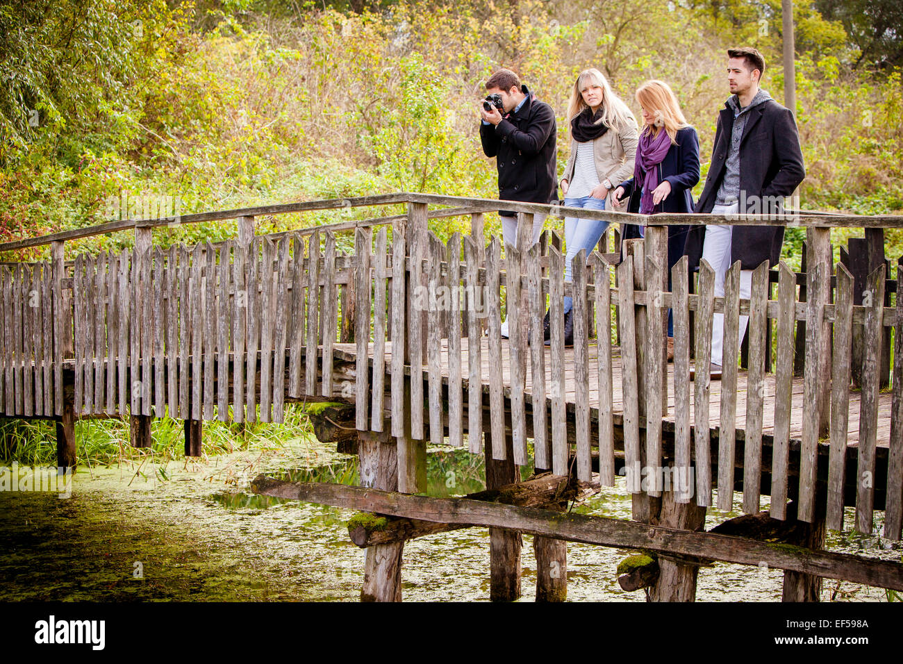 Friends standing bridge hi-res stock photography and images - Alamy