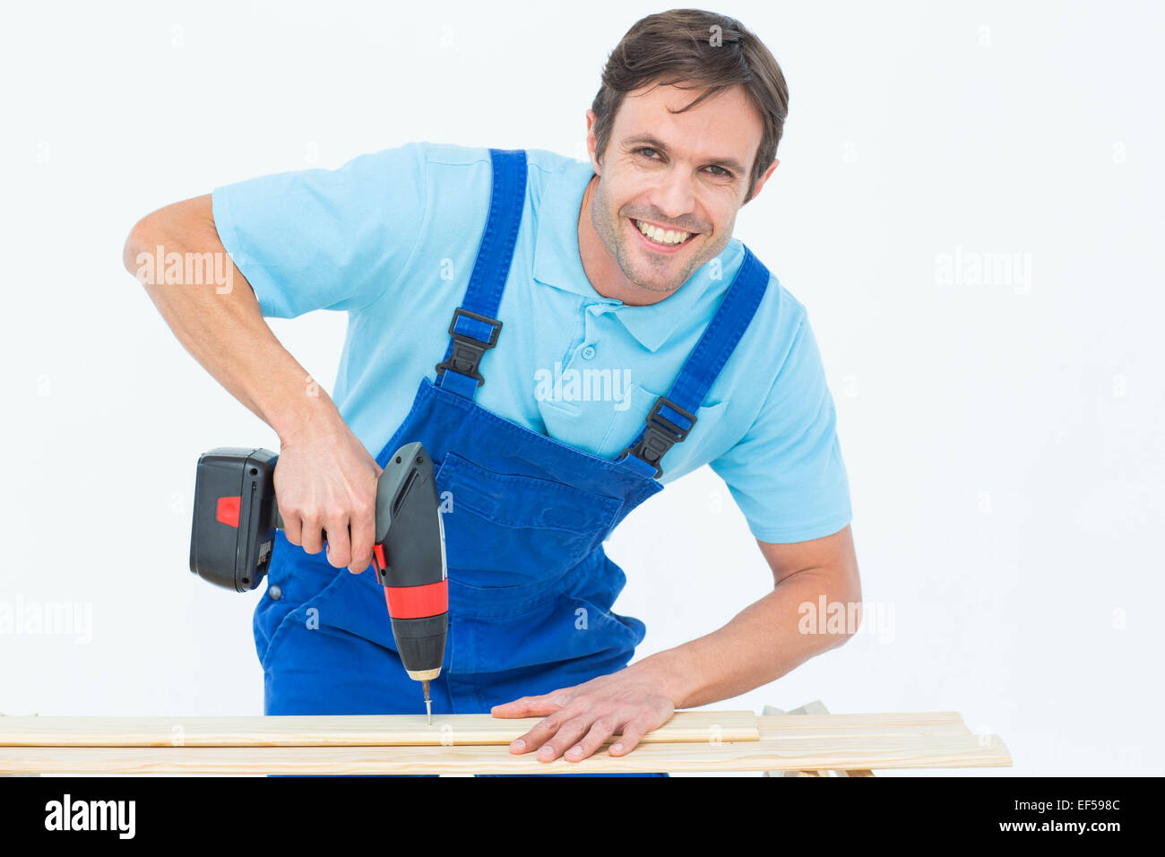 Carpenter using drill machine hi-res stock photography and images - Alamy