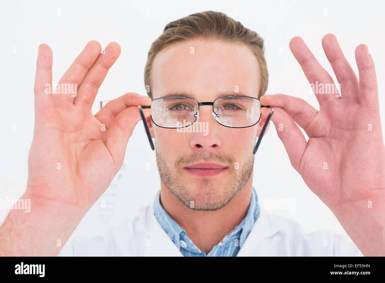 Optician showing glasses man hi-res stock photography and images - Alamy