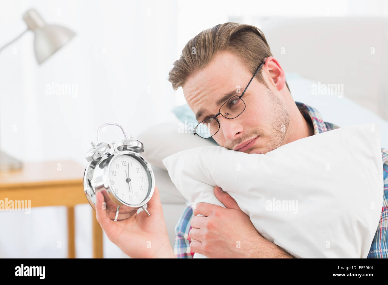 Clock bored man hi-res stock photography and images - Alamy