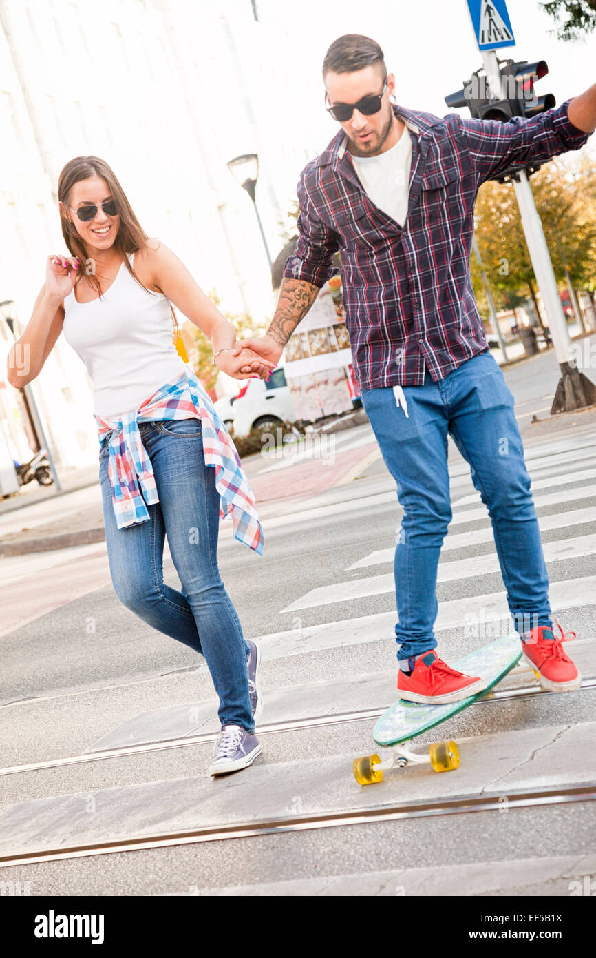 Women helping men hi-res stock photography and images - Alamy