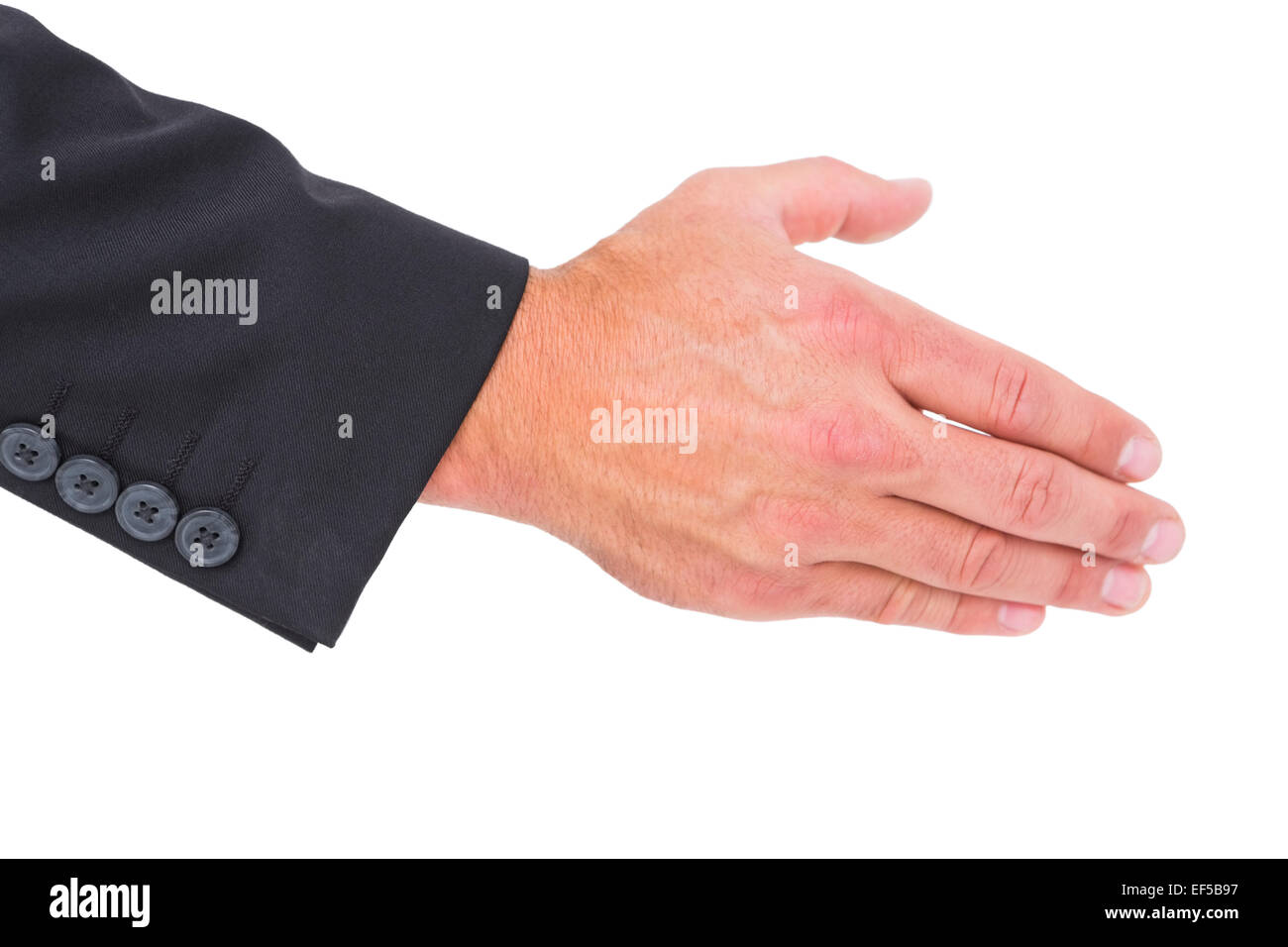 Businessman holding his hand out Stock Photo - Alamy