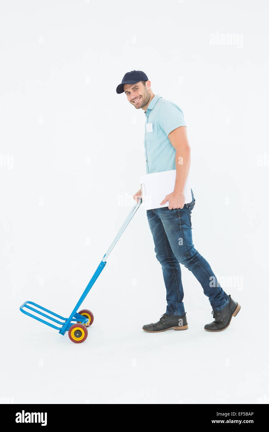 Delivery man empty trolley hi-res stock photography and images - Alamy