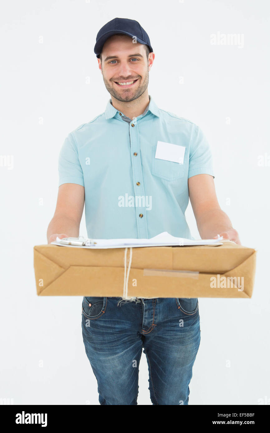 Handsome courier man with parcel Stock Photo - Alamy