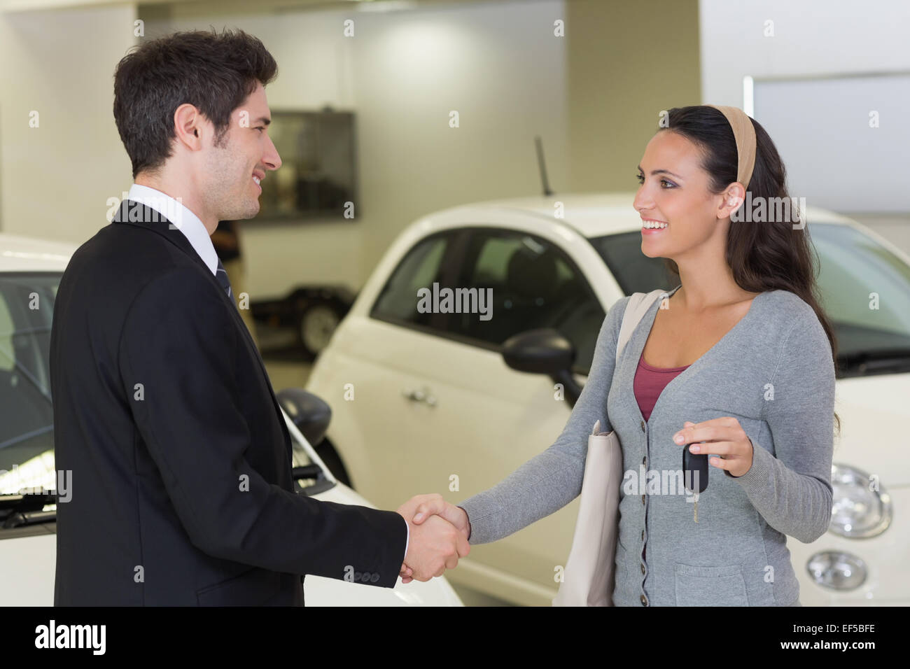 Businessman giving handshake customer hi-res stock photography and images - Alamy