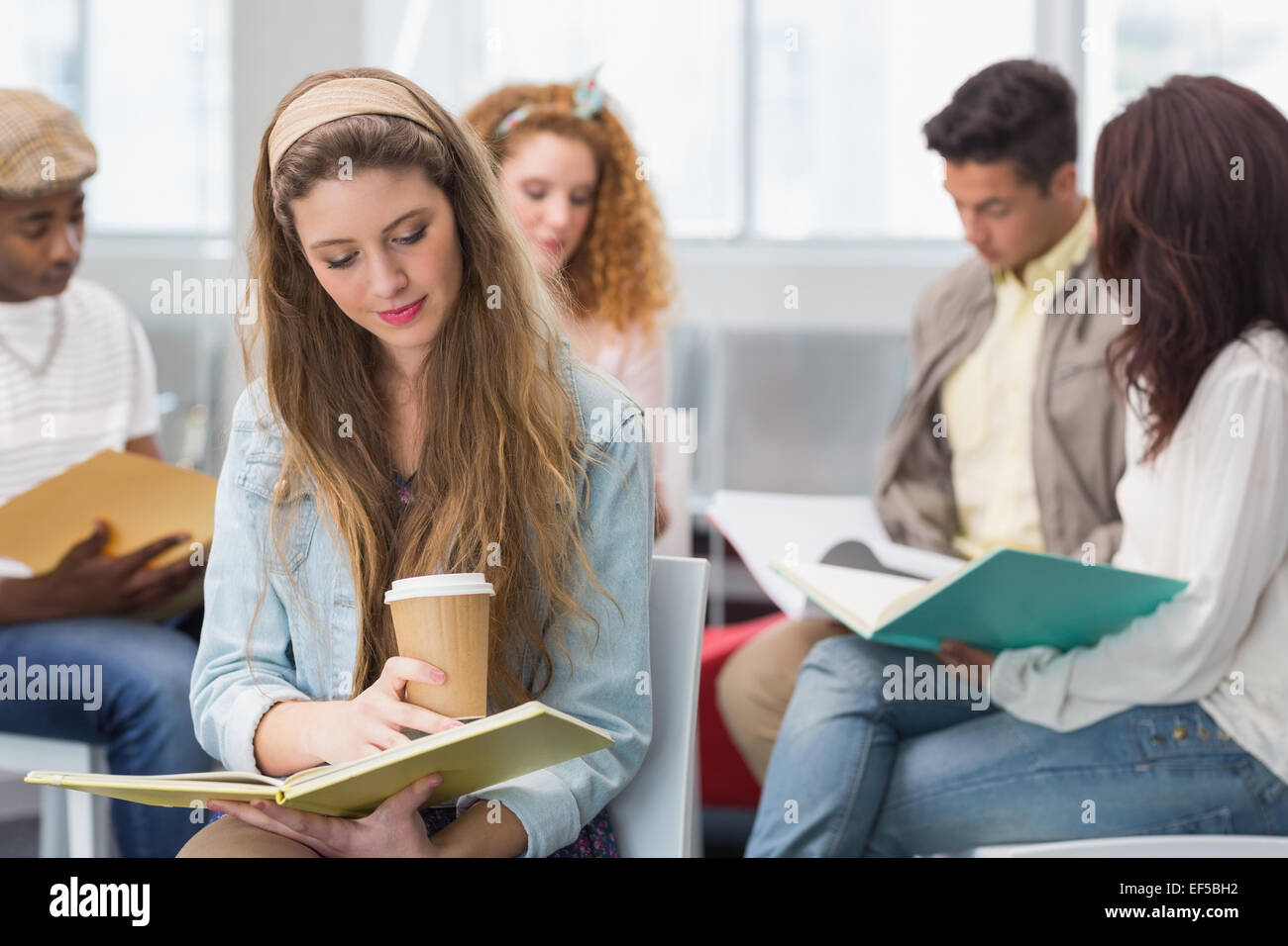 Fashion student reading her notes Stock Photo - Alamy