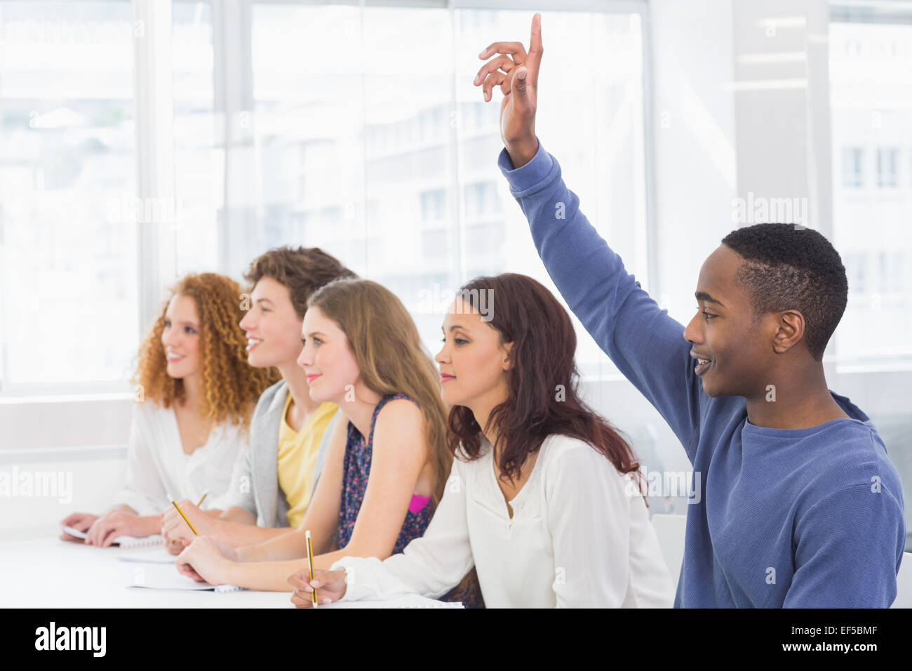 Fashion students being attentive in class Stock Photo - Alamy