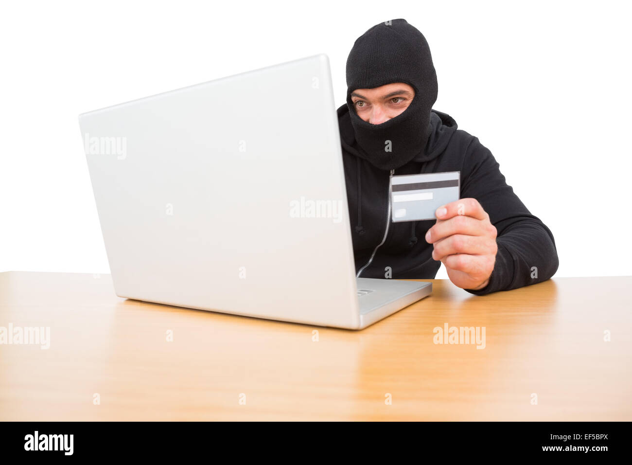 Hacker using card to steal identity Stock Photo - Alamy