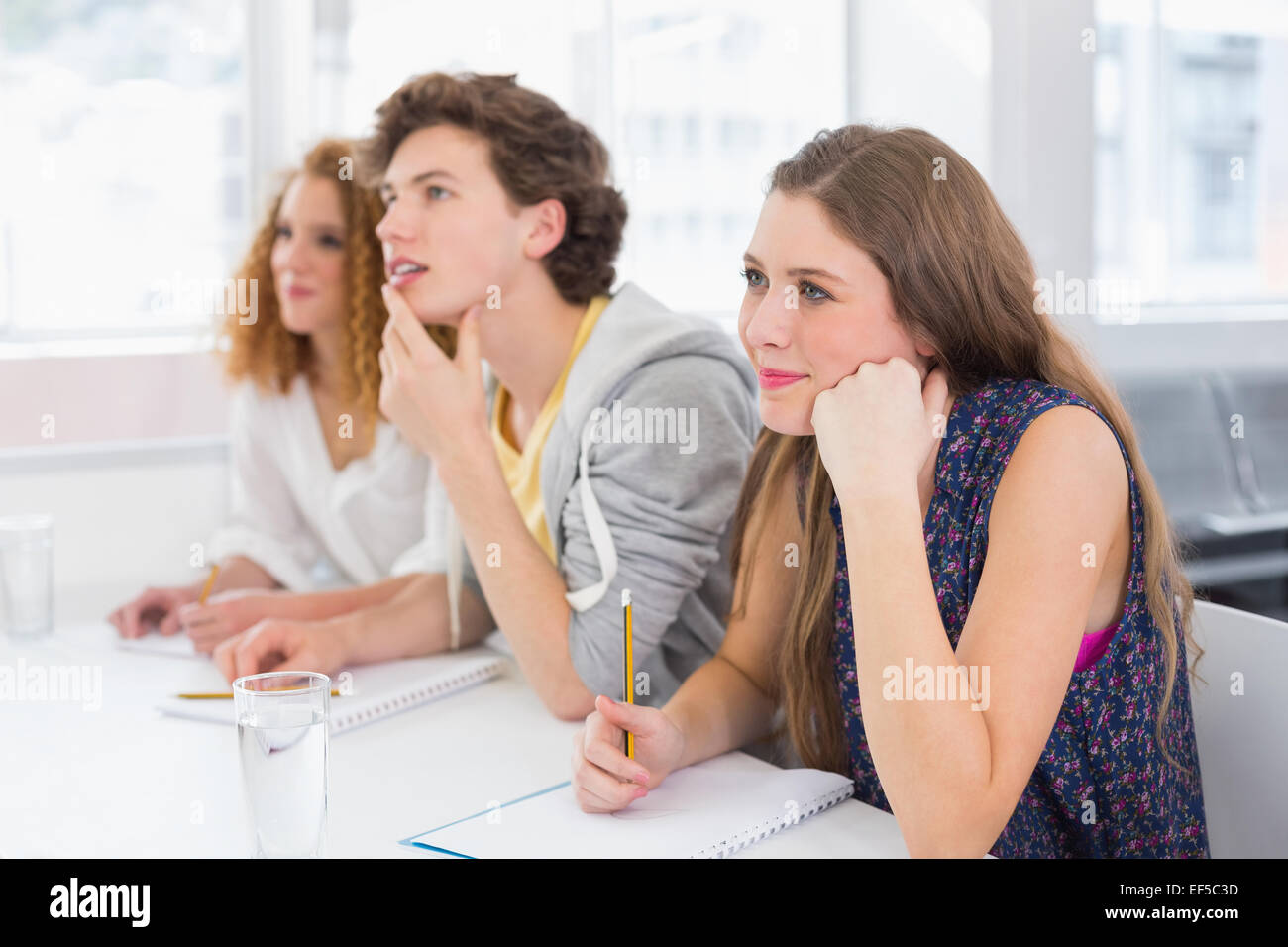 Fashion students being attentive in class Stock Photo - Alamy