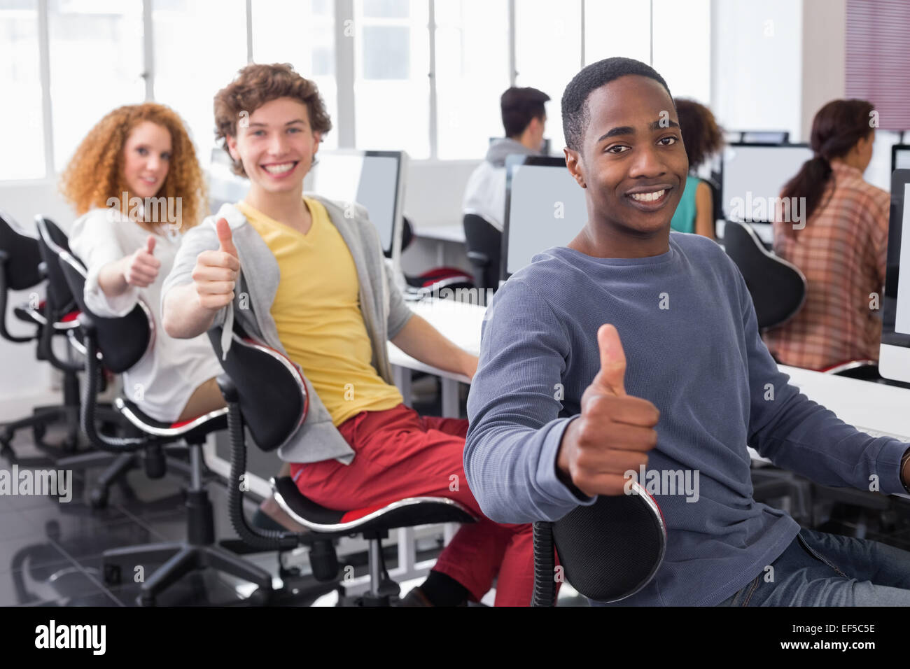 Students working in computer room Stock Photo - Alamy