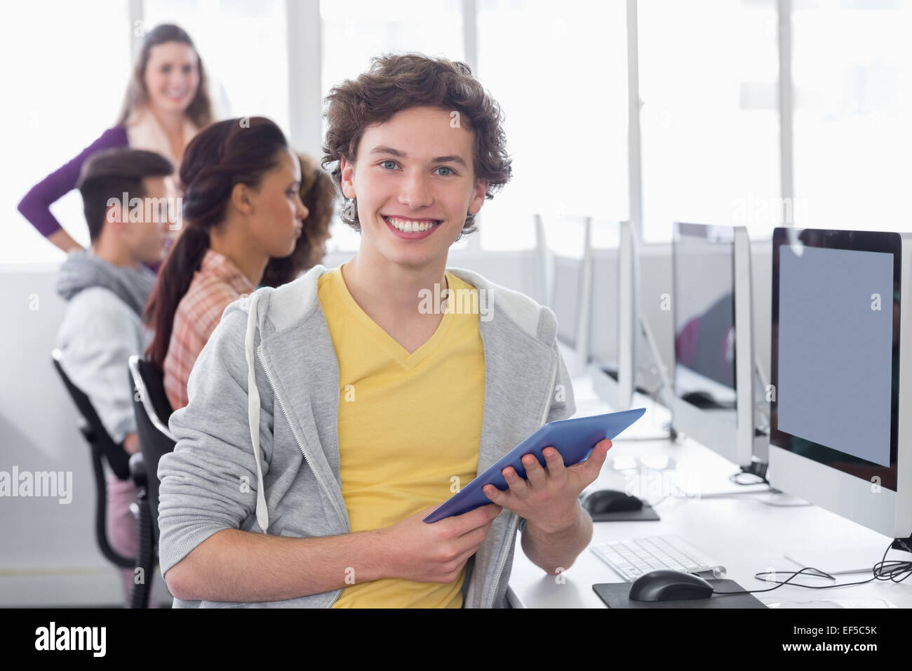 Students working in computer room Stock Photo - Alamy