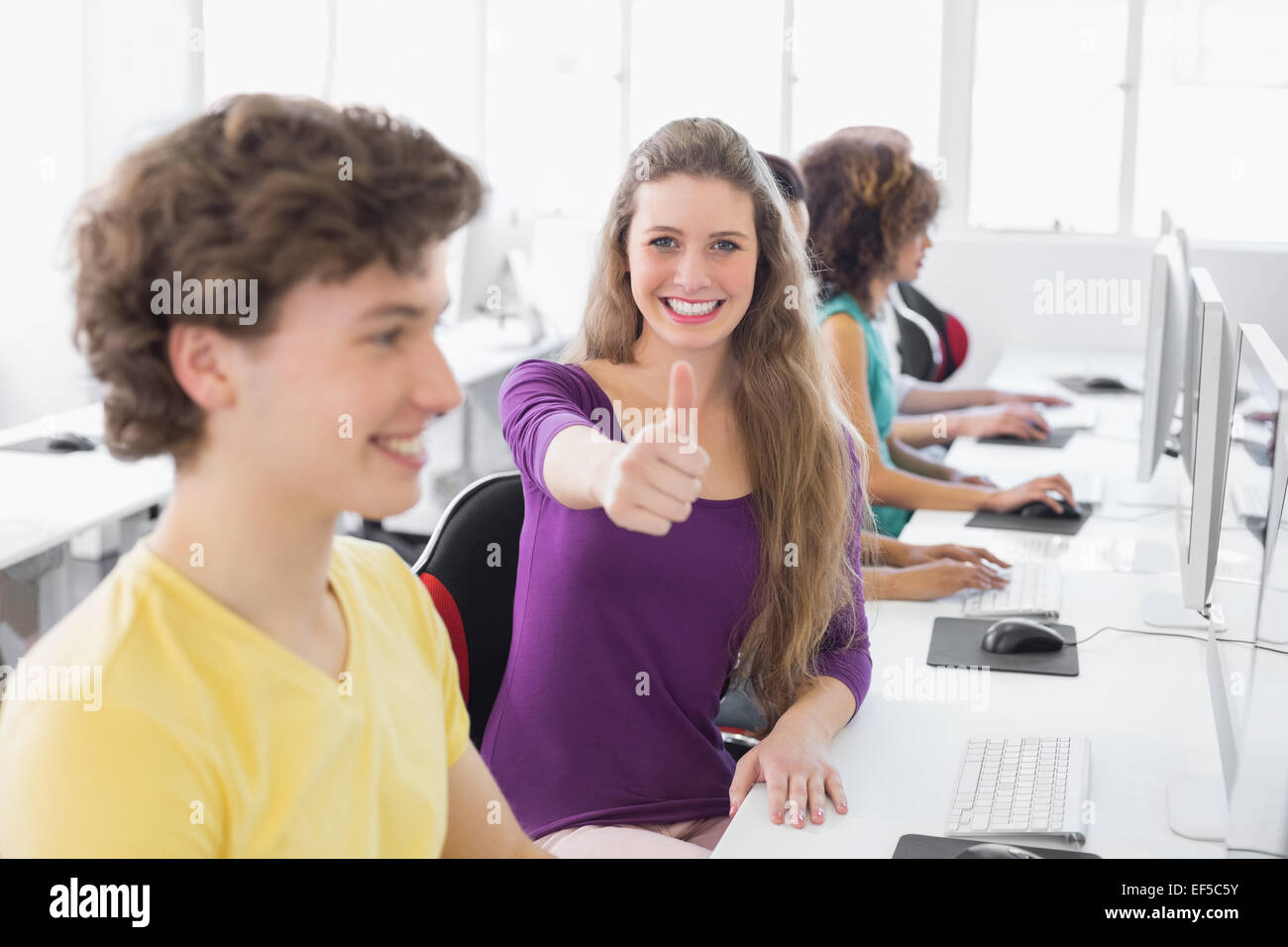 Students working in computer room Stock Photo - Alamy