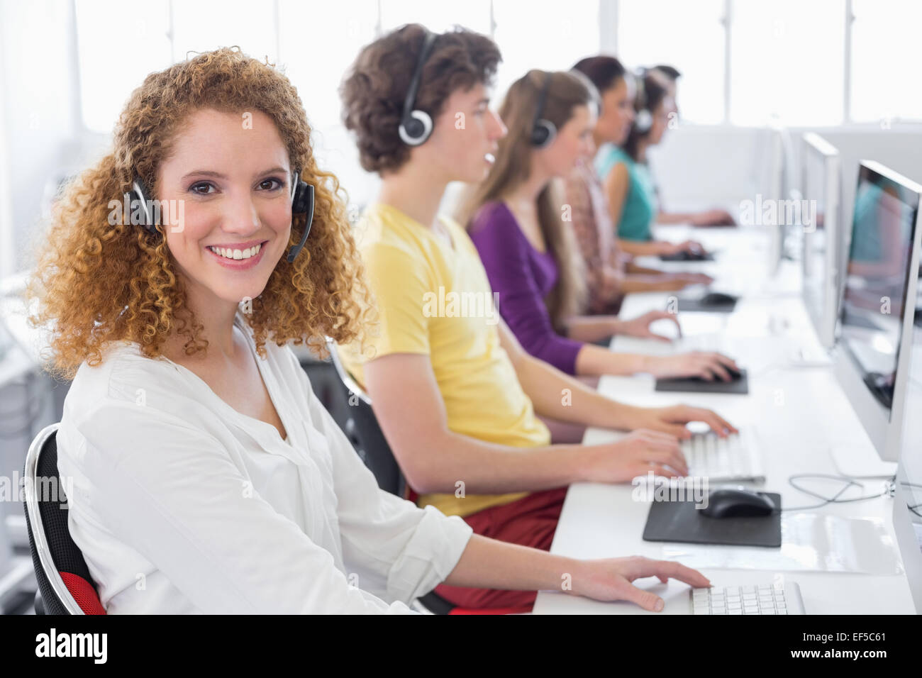 Students working in computer room Stock Photo - Alamy